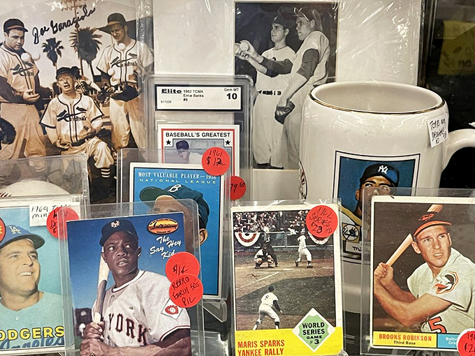 Baseball cards that capture frozen moments of America's pastime, where legends like Mays and Robinson still swing for the fences in mint condition.