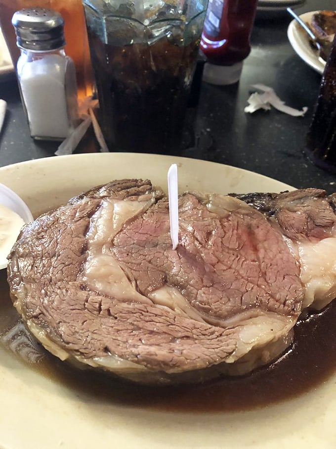 The 16oz prime rib arrives like a carnivore's dream&mdash;perfectly pink, impossibly tender, and large enough to make you question your life choices.
