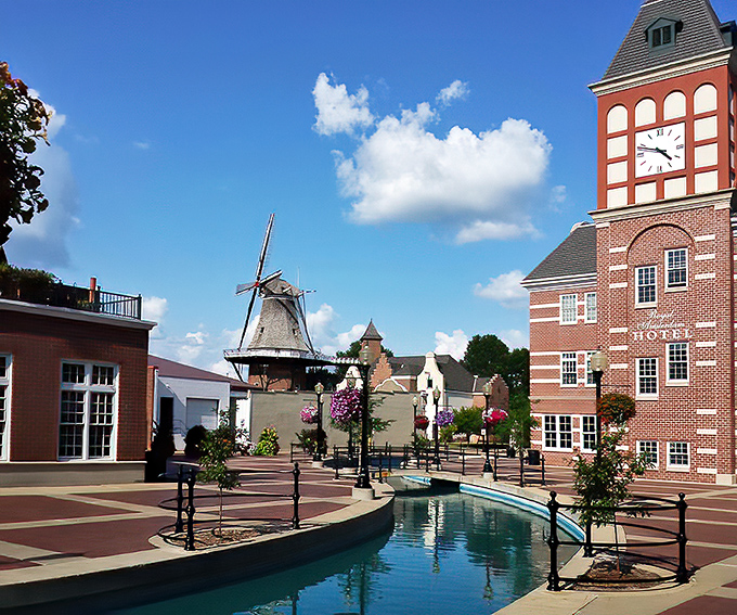 Molengracht Plaza's canal makes you question your GPS coordinates. Did we just teleport to Amsterdam? The clock tower keeps Iowa time, but everything else screams Netherlands.