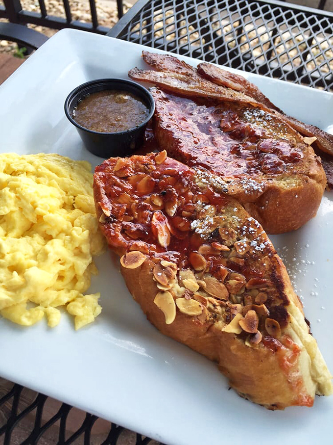 The Almond Three Legion French toast arrives with perfectly scrambled eggs&mdash;a breakfast duo that deserves its own morning talk show. 