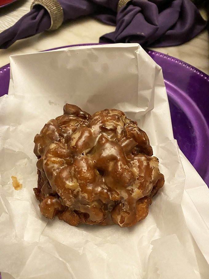 The topography of a perfect apple fritter: peaks of crispy dough, valleys of glaze, and hidden pockets of apple waiting to be discovered.
