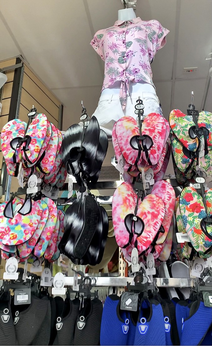 A colorful explosion of summer footwear that makes flip-flop shopping feel like an artistic experience rather than a mundane necessity.