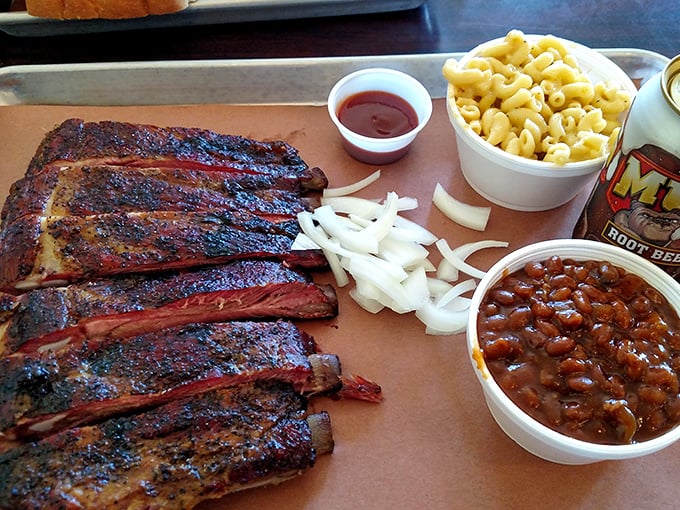 A rack of ribs with sides of mac and cheese and brisket beans&mdash;the holy trinity of comfort that makes you want to hug the pitmaster.