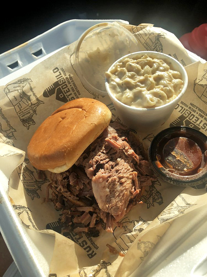 Mac-n-cheese topped with goldfish crackers alongside brisket is the comfort food equivalent of finding money in your winter coat—unexpected joy in familiar places.