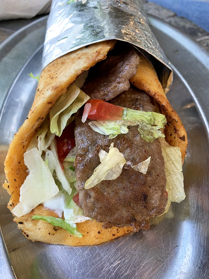 This beef gyro isn't just a sandwich; it's an edible love letter from Greece, with each bite telling stories of Mediterranean sunshine.