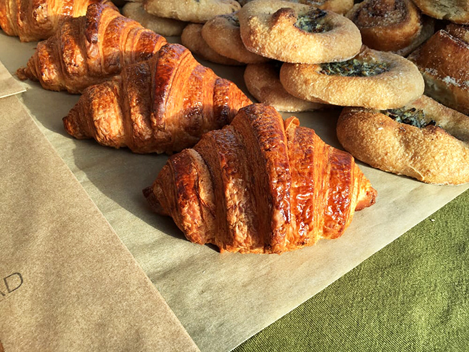 Lined up like butter-laden soldiers ready for delicious battle, these croissants showcase the almost mathematical precision required for perfect lamination.
