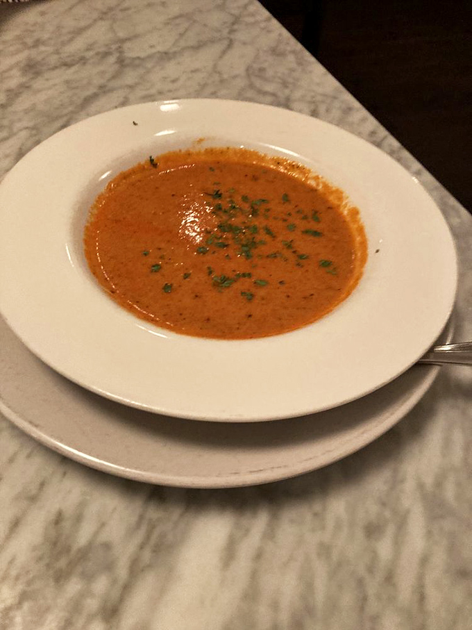 This bisque doesn't whisper its flavors&mdash;it announces them with a creamy, herb-flecked fanfare that demands your full attention.