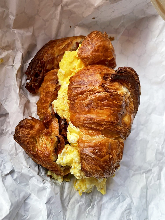 Breakfast sandwich or work of art? This croissant stuffed with eggs brings new meaning to "breaking your fast" by breaking your willpower.