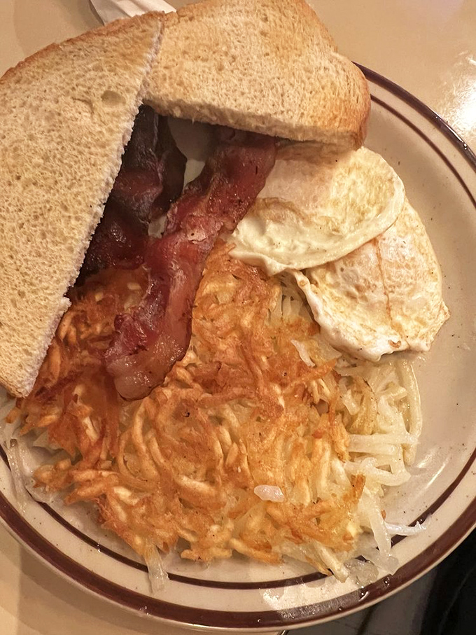 The breakfast sandwich that makes you question why you'd ever skip the most important meal of the day. Those hash browns deserve their own fan club.