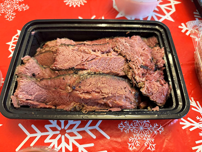 Brisket sliced with the reverence it deserves, displaying that perfect pink smoke ring that separates the barbecue artists from the merely ambitious.