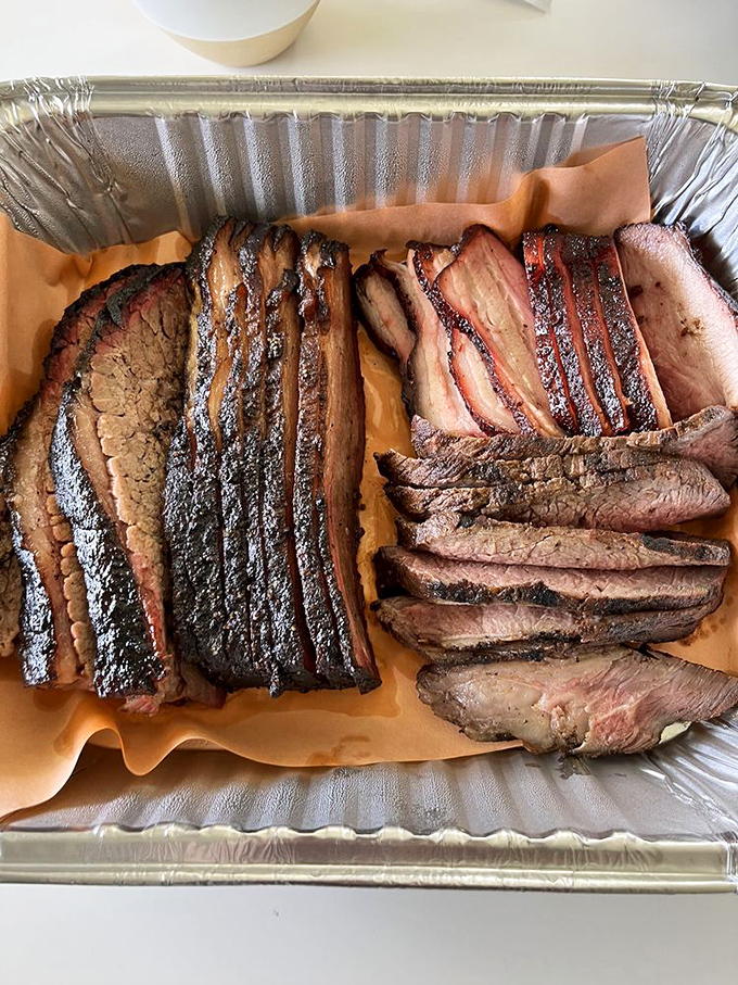 Meat candy in its natural habitat. The brisket and pork belly duo that makes vegetarians question their life choices and carnivores reach for their phones.