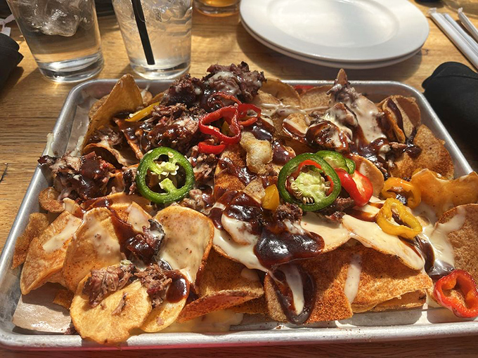 These BBQ nachos aren't just a meal&mdash;they're an architectural marvel where every chip is fighting for the noble cause of delivering meat to mouth.