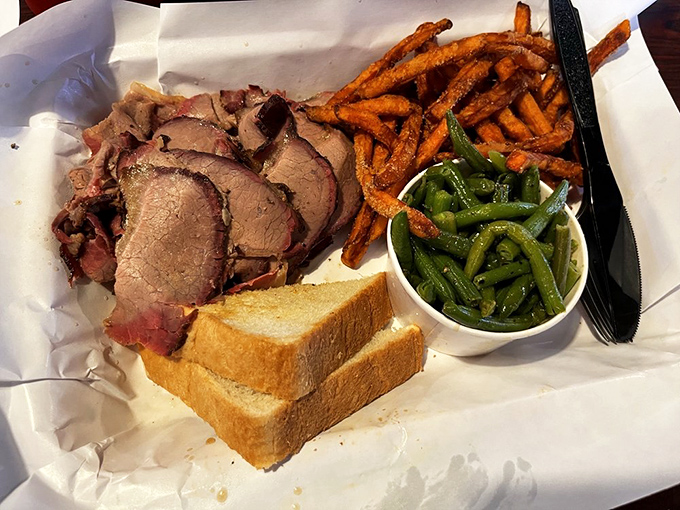 Every slice of this brisket tells a story of patience&mdash;14 hours in the smoker translates to 14 seconds of pure joy on your palate.