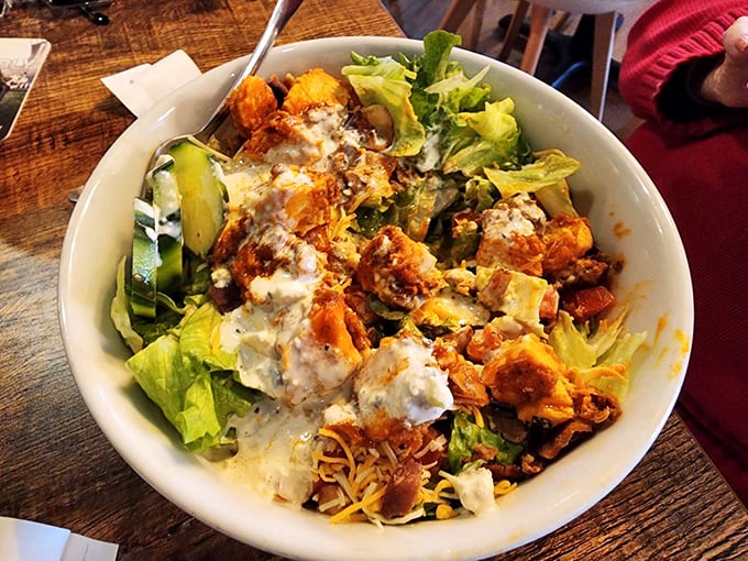 This isn't just a salad—it's a Buffalo chicken rebellion in a bowl, where crispy chicken and fresh greens find perfect harmony.