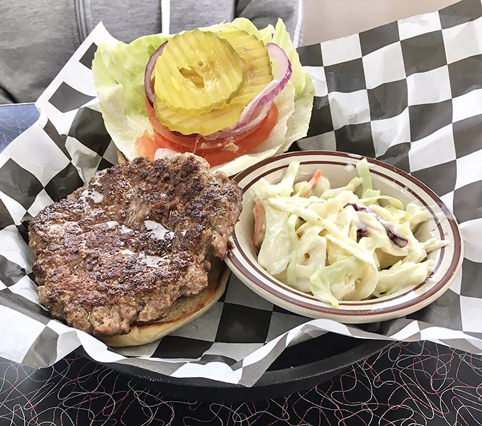 This isn't just a burger, it's architectural perfection&mdash;hand-formed patty with a slight crust, fresh toppings, and coleslaw that isn't an afterthought.