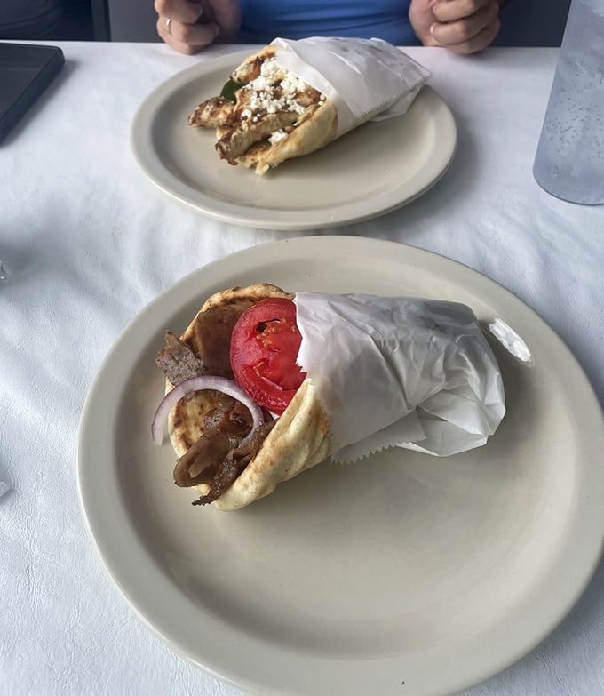 Two gyros are better than one! These handheld Greek treasures prove that sometimes the simplest meals create the most profound joy.