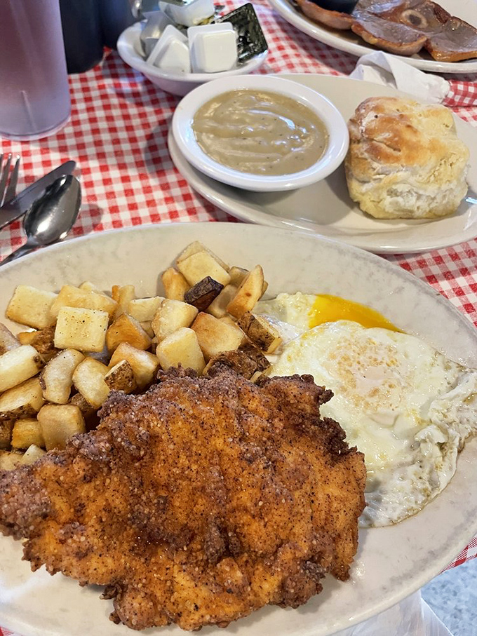 This breakfast platter is Southern poetry on a plate&mdash;golden-crisp chicken fried steak, home fries, eggs, and creamy grits that make you forget counting calories was ever invented.