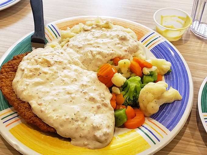 The chicken fried steak here doesn't just share the plate with vegetables&mdash;it commands the plate while graciously allowing the veggies to attend.