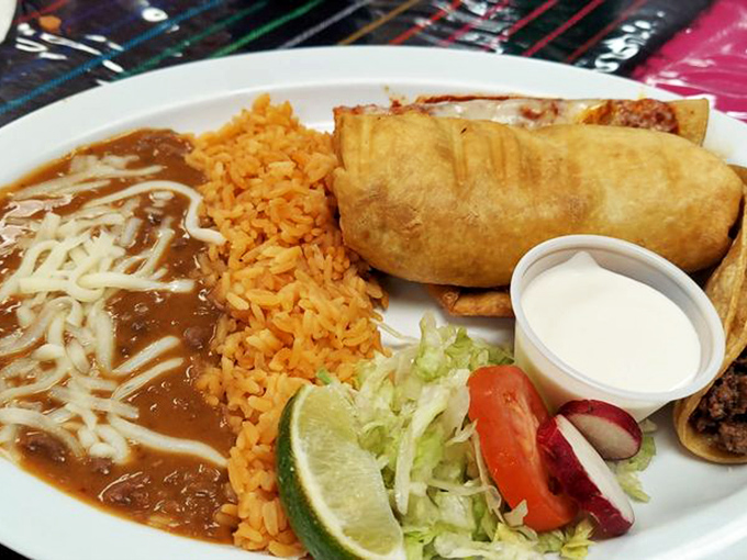 Golden-fried perfection meets that signature orange rice. This chimichanga has the perfect crisp-to-squish ratio that dreams are made of.