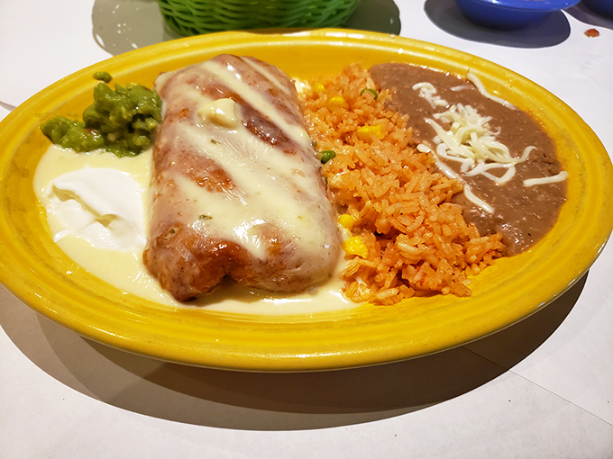The yellow plate matches the building, but it's what's on it that matters&mdash;a chimichanga that's achieved the perfect crisp-to-tender ratio.