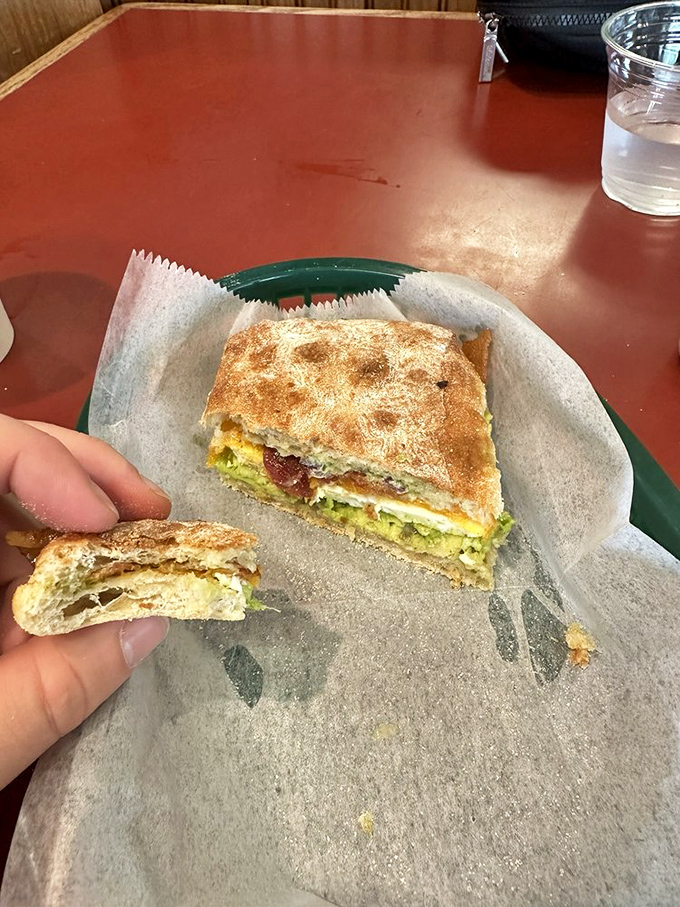 This sandwich isn't just lunch &ndash; it's architecture. Layers of fresh ingredients nestled between artisan bread that shatters perfectly with each bite.