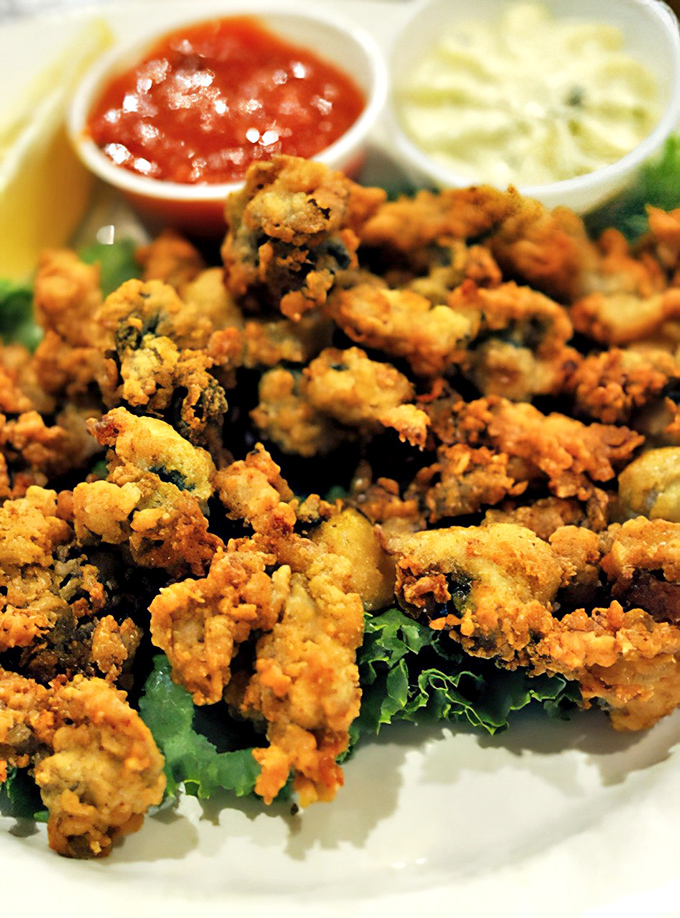 These fried clams aren't just appetizers, they're little nuggets of oceanic bliss that make you question why you live so far from the coast.