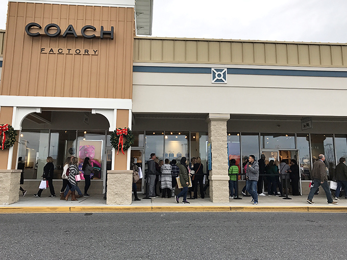 The Coach store during peak shopping season&mdash;where patience becomes a virtue and credit card reflexes are tested in the ultimate retail Olympics.