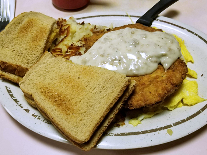 This golden-crusted masterpiece drowning in gravy could make a vegetarian reconsider their life choices.