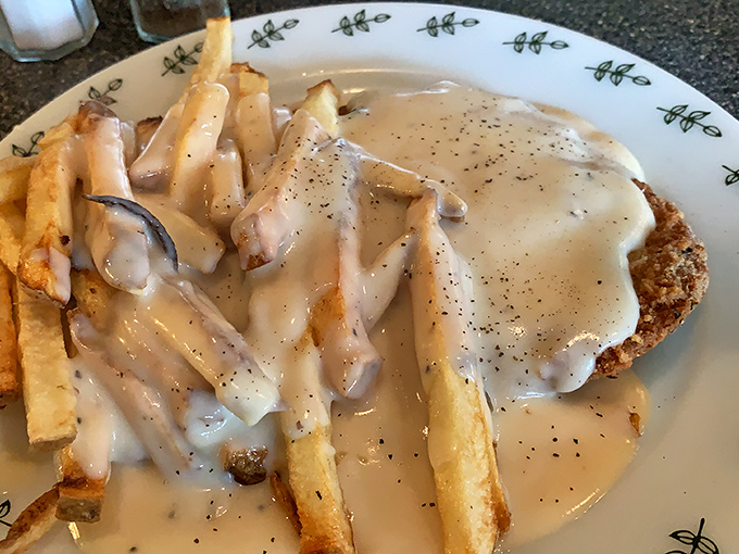 Gravy isn't just a condiment here&mdash;it's practically a philosophy. This country fried steak swimming in peppery goodness makes a compelling argument for its worldview. 