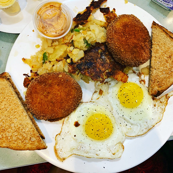 Not so much a breakfast as a declaration of morning ambition&mdash;crispy crab cakes, sunny eggs, and potatoes that deserve their own fan club.