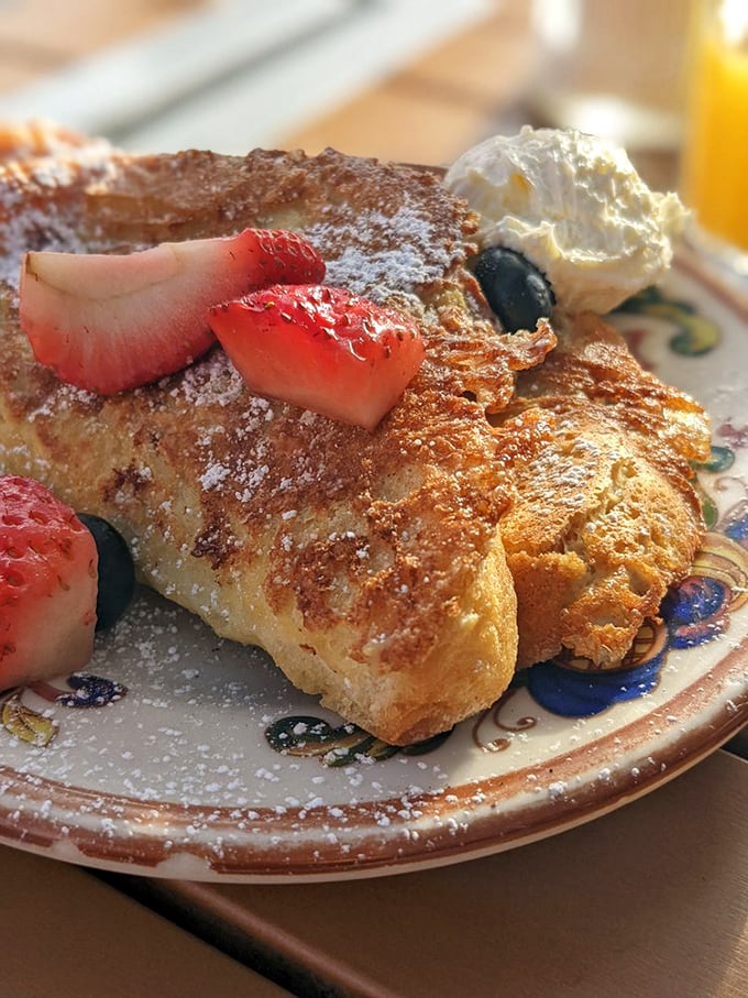 Golden-brown perfection that makes you question all other breakfasts. This French toast's crispy exterior gives way to a custardy center that's practically therapeutic.