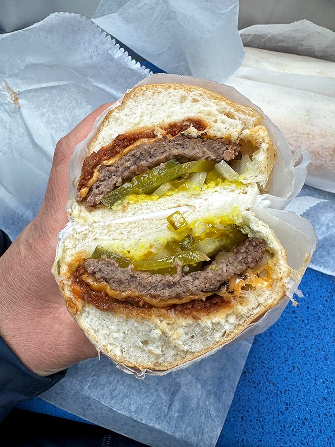 Behold the cross-section of perfection: juicy patty, melted cheese, and those signature pickles that have been making Glen Burnie residents smile since the Truman administration.