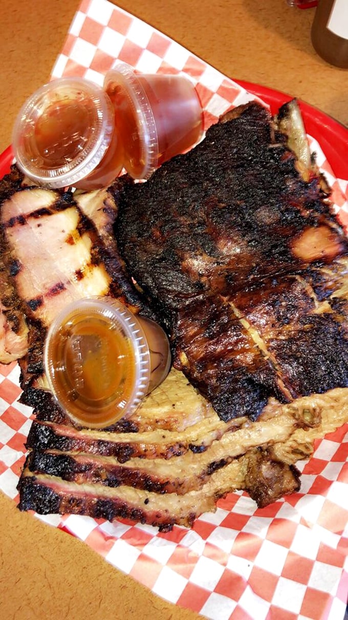 A meat portfolio more diverse than my retirement account. Those sauce cups aren't accessories&mdash;they're essential flavor investments.