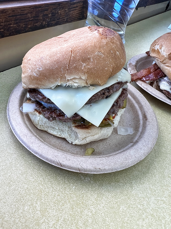 This isn't just a double cheeseburger&mdash;it's a masterclass in proper meat-to-cheese ratio, served on a paper plate that knows its place.