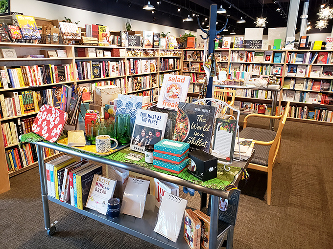 This display cart is like a dinner party where all the most interesting books in town have gathered to meet curious readers.