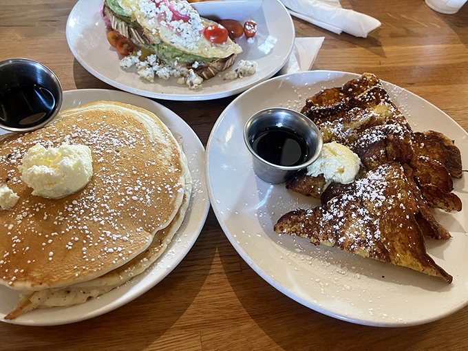The breakfast dilemma: fluffy pancakes or decadent French toast? At Luci's, the correct answer is clearly "Yes, please."