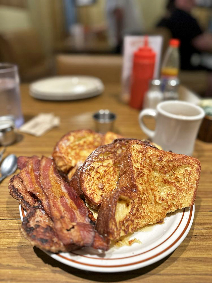 French toast and bacon: the breakfast power couple that's been making mornings bearable since time immemorial. Relationship goals on a plate.