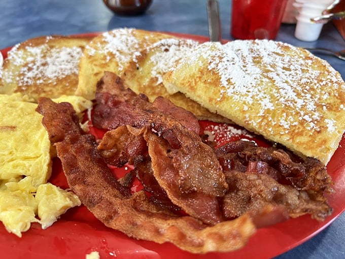 The breakfast trifecta: French toast, bacon, and eggs. Some relationships are complicated, but this one's been working flawlessly for decades.