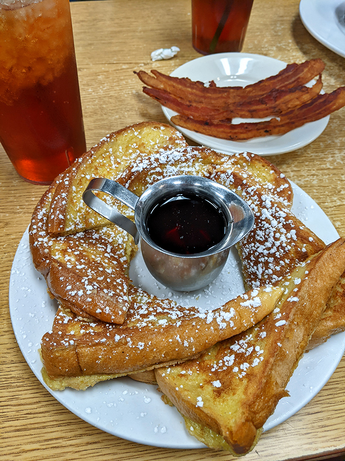 The French toast and bacon combo&mdash;proof that soulmates exist on a plate. Sweet meets savory in a romance more satisfying than any Hollywood ending.
