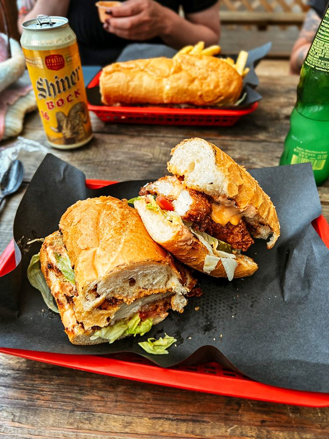 The fried chicken po' boy: where crispy, juicy Southern bird meets French bread in a sandwich so good it deserves its own ZIP code.