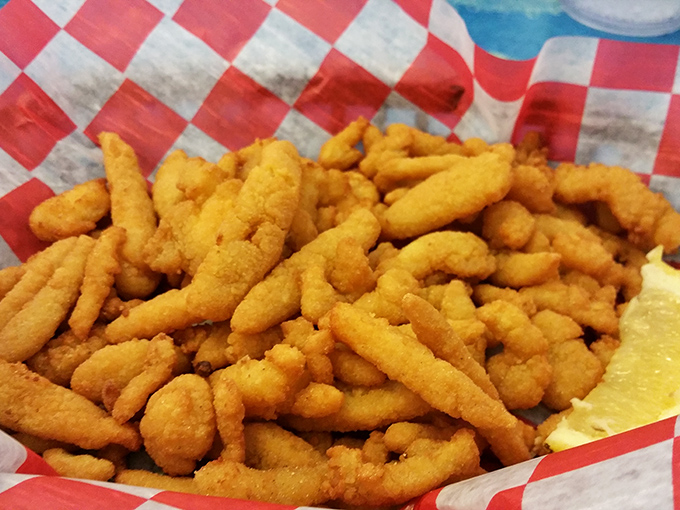 Fried clam strips that crunch like autumn leaves but taste like summer vacation. The perfect ratio of crispy coating to tender clam&mdash;a textural masterpiece.