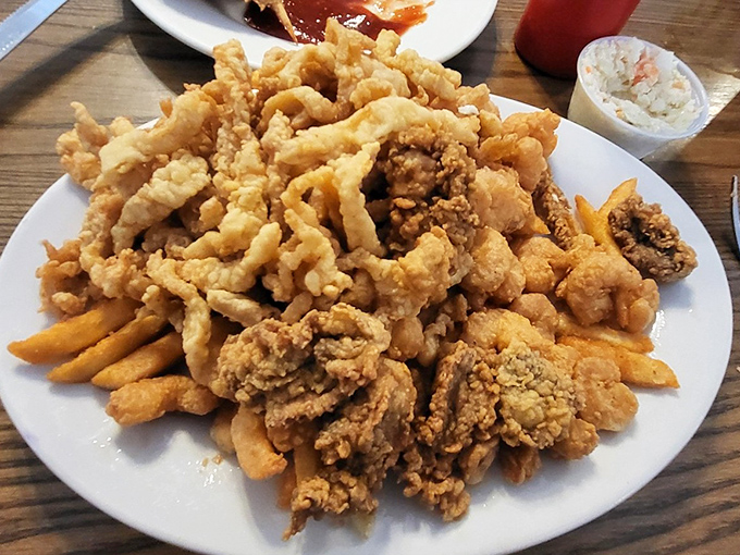 This isn't just dinner, it's an edible treasure chest. The french fries are merely supporting actors in this seafood blockbuster.