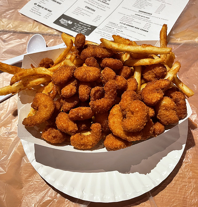 Golden-fried shrimp and crispy fries&mdash;the comfort food of coastal dreams. This plate doesn't need a fancy description; it just needs to get in my belly.