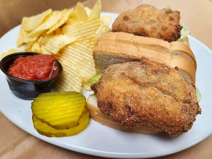 Golden-fried perfection meets pillowy bread in a sandwich that makes you wonder why you'd ever order anything else.