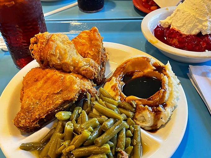 Some seek enlightenment on mountaintops; I found mine in this perfect harmony of crispy chicken, garden-fresh green beans, and cloud-like mashed potatoes.