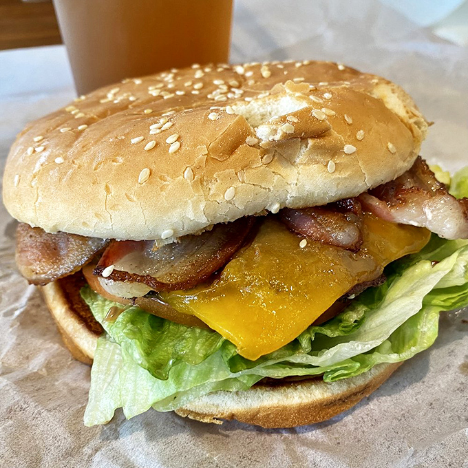 The Fuller Burger in all its glory&mdash;where bacon and cheese don't just top the burger, they become one with it in a beautiful marriage of flavors. 
