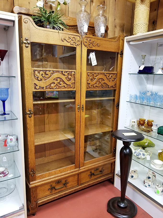 This isn't just furniture—it's functional art with stories etched into every carved detail. That cabinet has probably witnessed more history than your high school textbook.