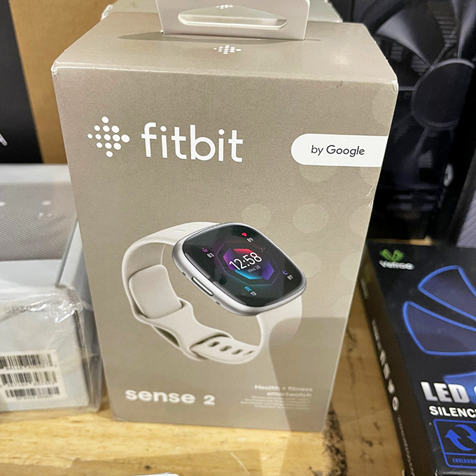 A Fitbit Sense 2 in the wild! At regular stores, it costs an arm and a leg—ironically, the very things it tracks.