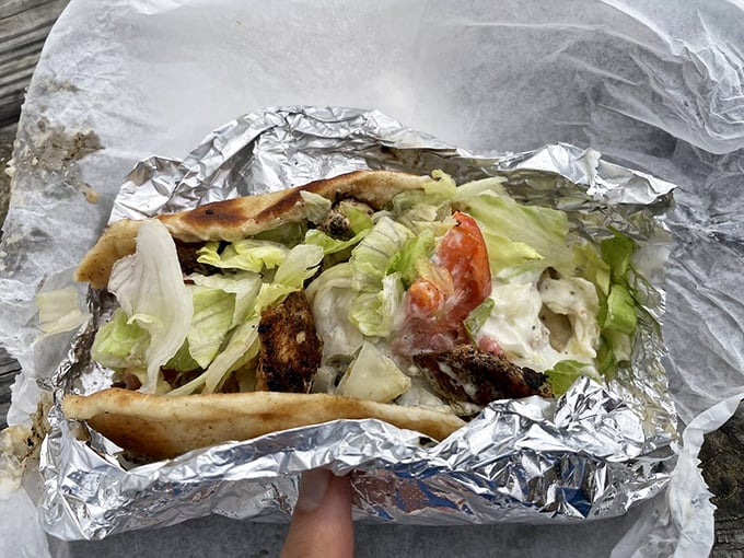 This isn't just a sandwich&mdash;it's edible architecture. Layers of grilled chicken, fresh veggies, and tzatziki create a handheld masterpiece that puts ordinary lunch to shame.