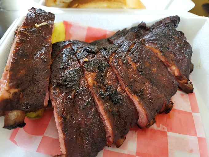 Half a rack never looked so whole. That perfect char speaks of patience, skill, and a relationship with fire that borders on the spiritual.